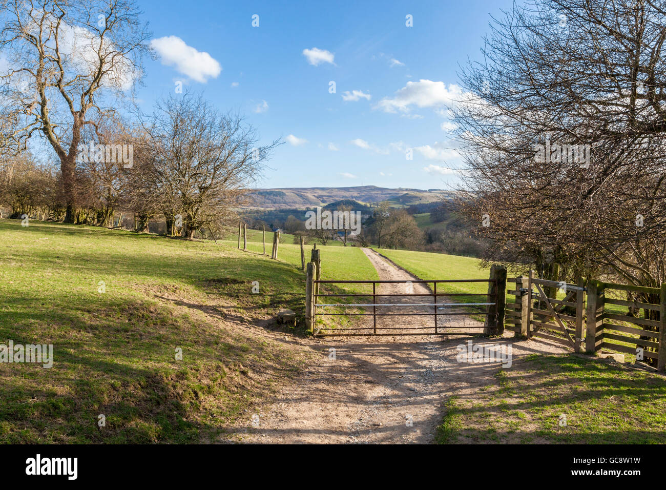Path through a landscape of fields on farmland in early Spring near ...