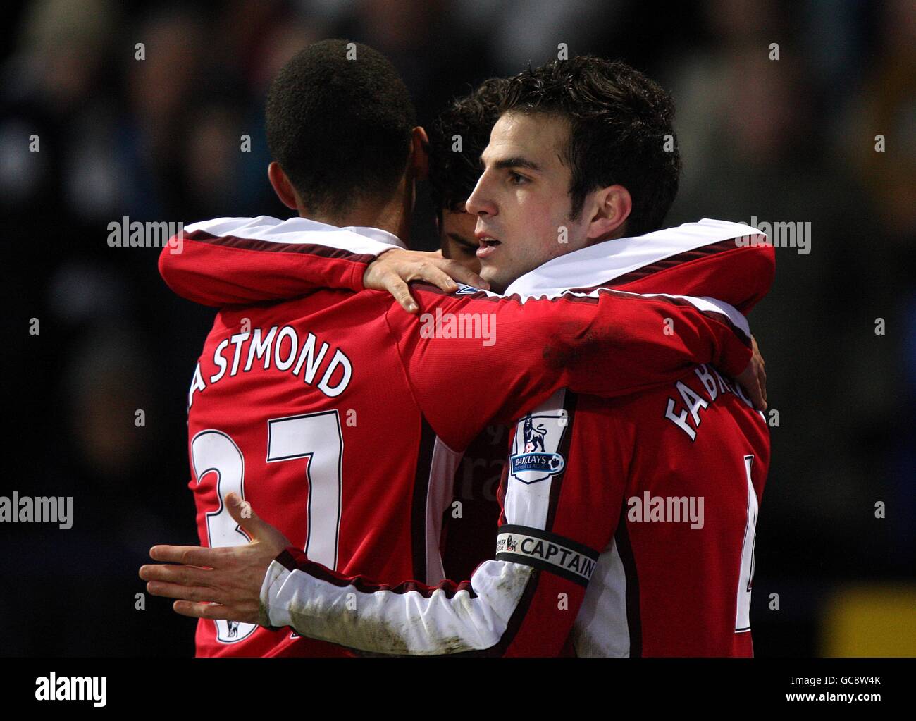 Arsenal's Francesc Fabregas (right) celebrates scoring his sides first ...