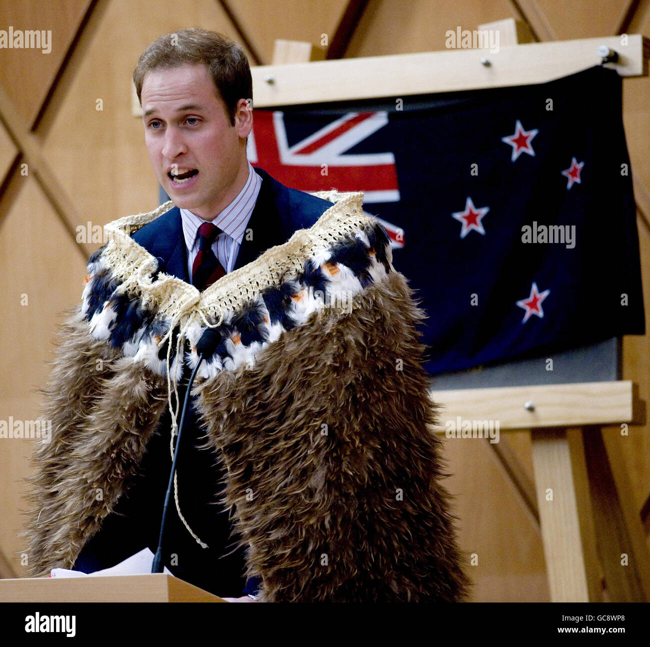 Prince William wears a cloak of kiwi feathers as he opens the new ...