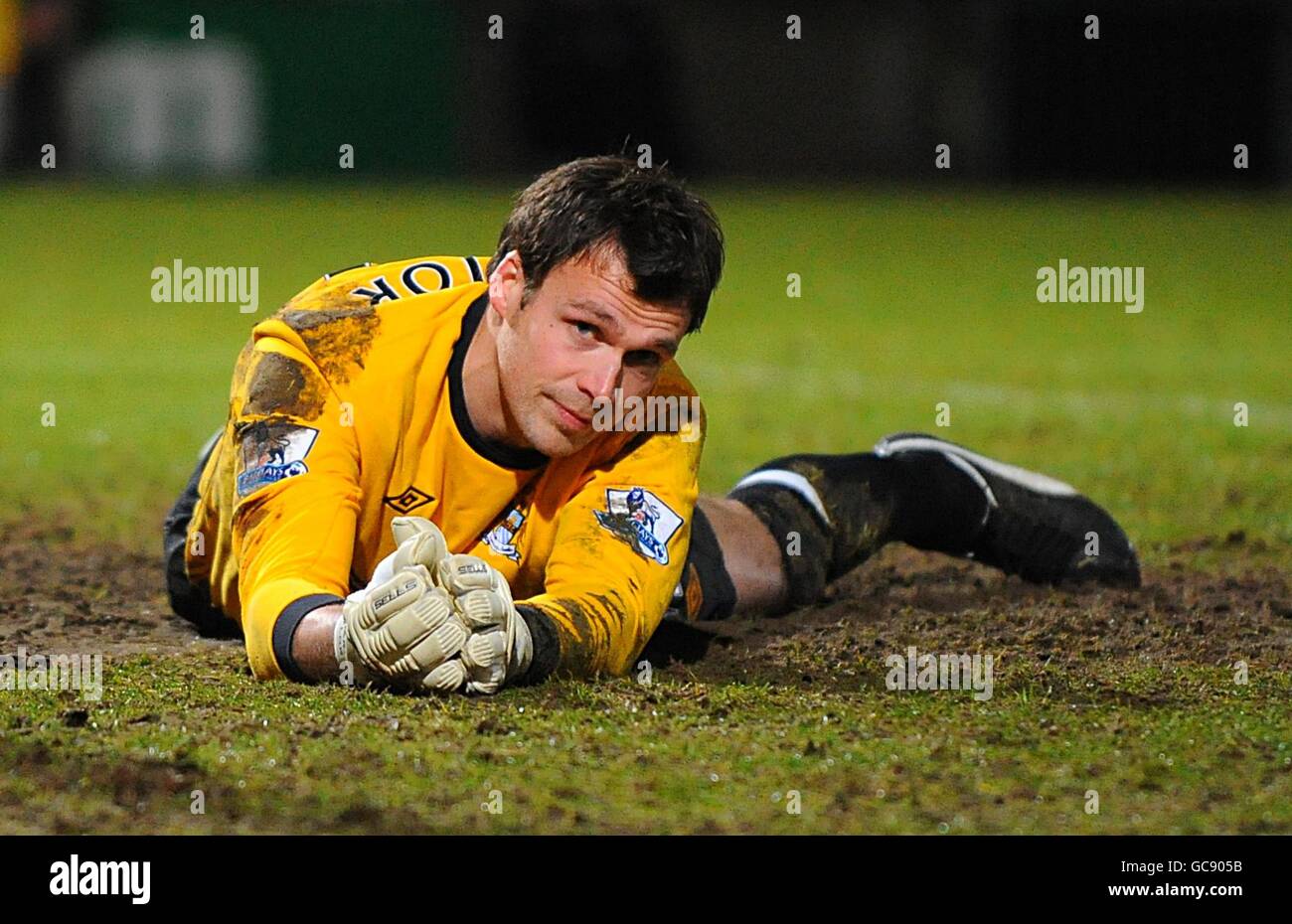 Manchester City's goalkeeper Stuart Taylor looks dejected after a ...