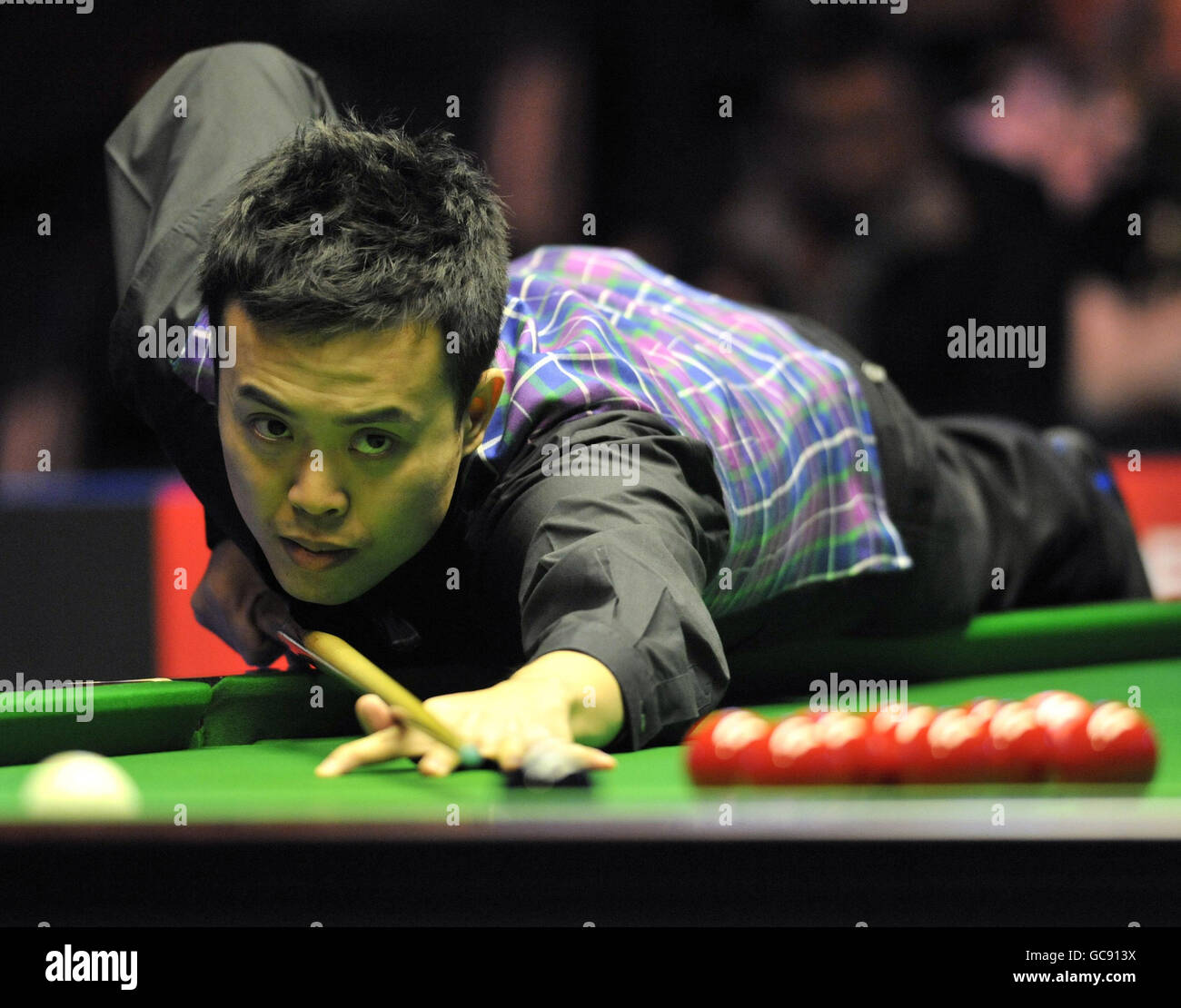 Marco Fu in action during the The Masters at Wembley Arena, London ...