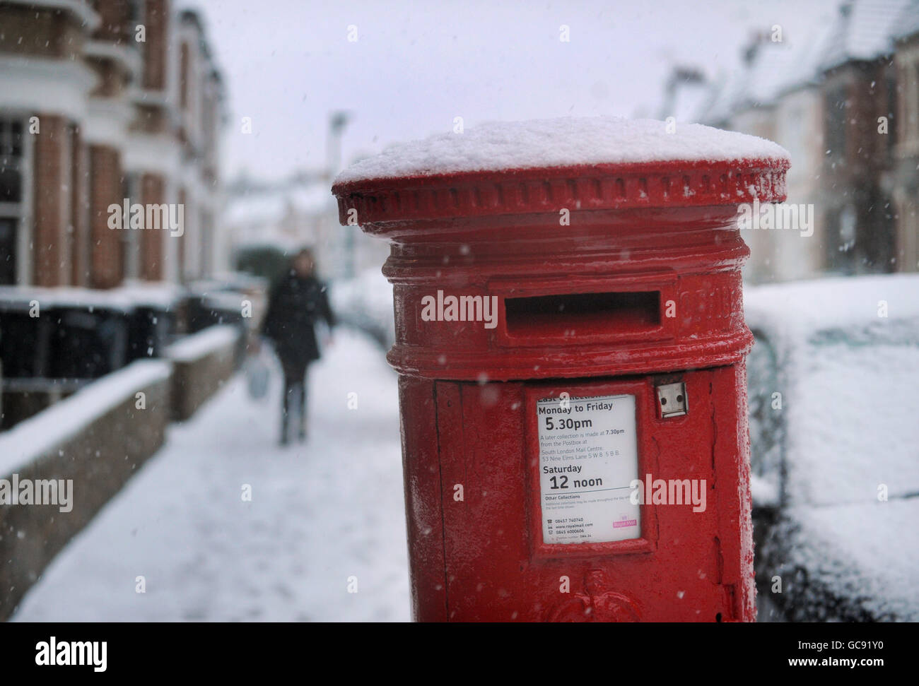 A post box covered with snow in Clapham, London Stock Photo - Alamy