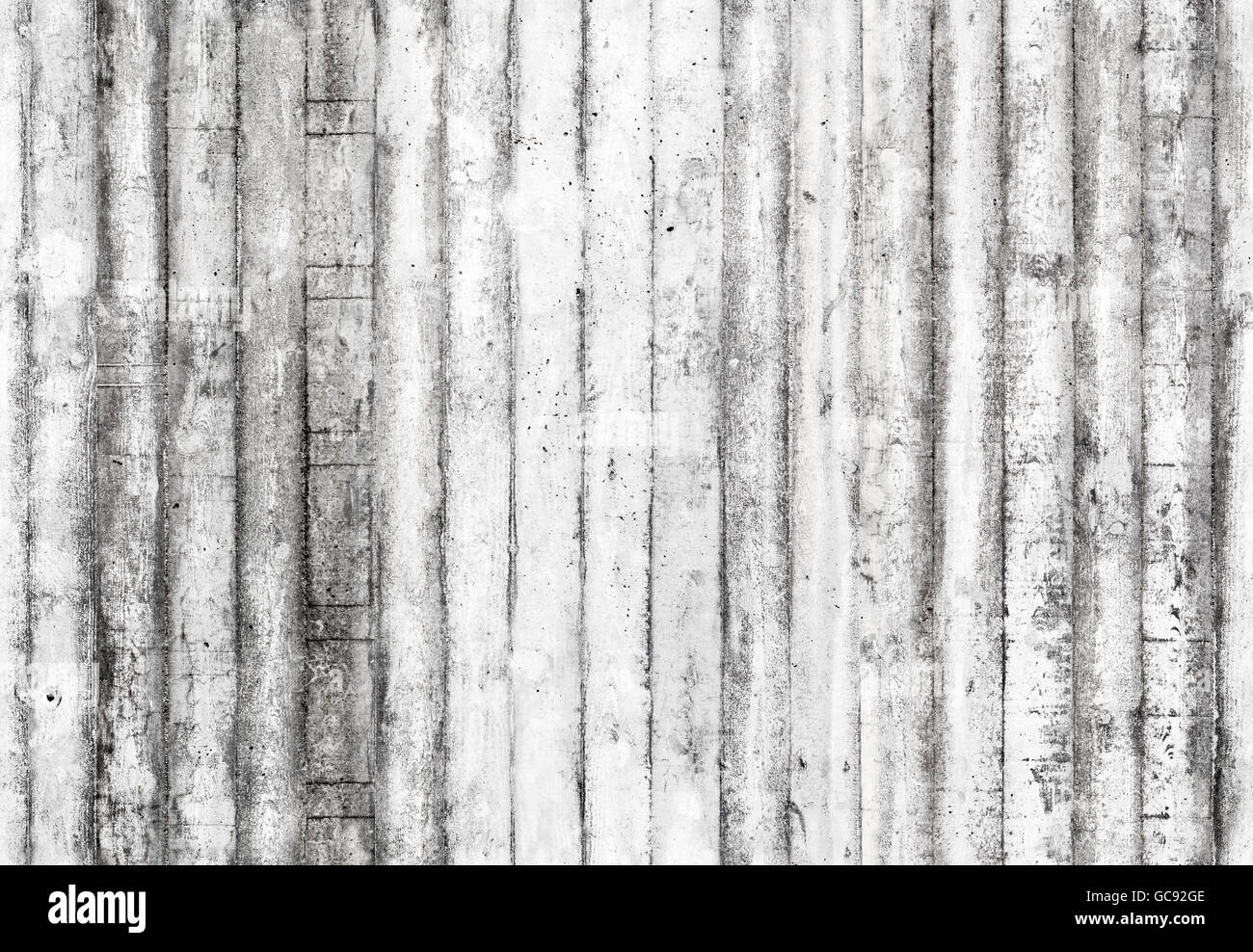 White concrete wall with relief pattern from timber formwork ...