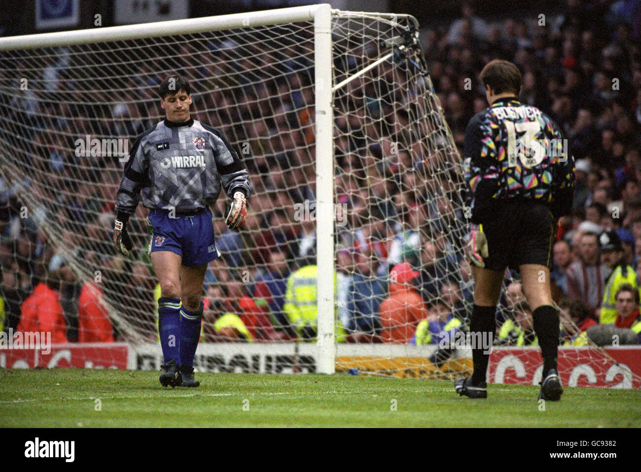 Tranmere Rovers goalkeeper Eric Nixon (l) passes Aston Villa goalkeeper ...
