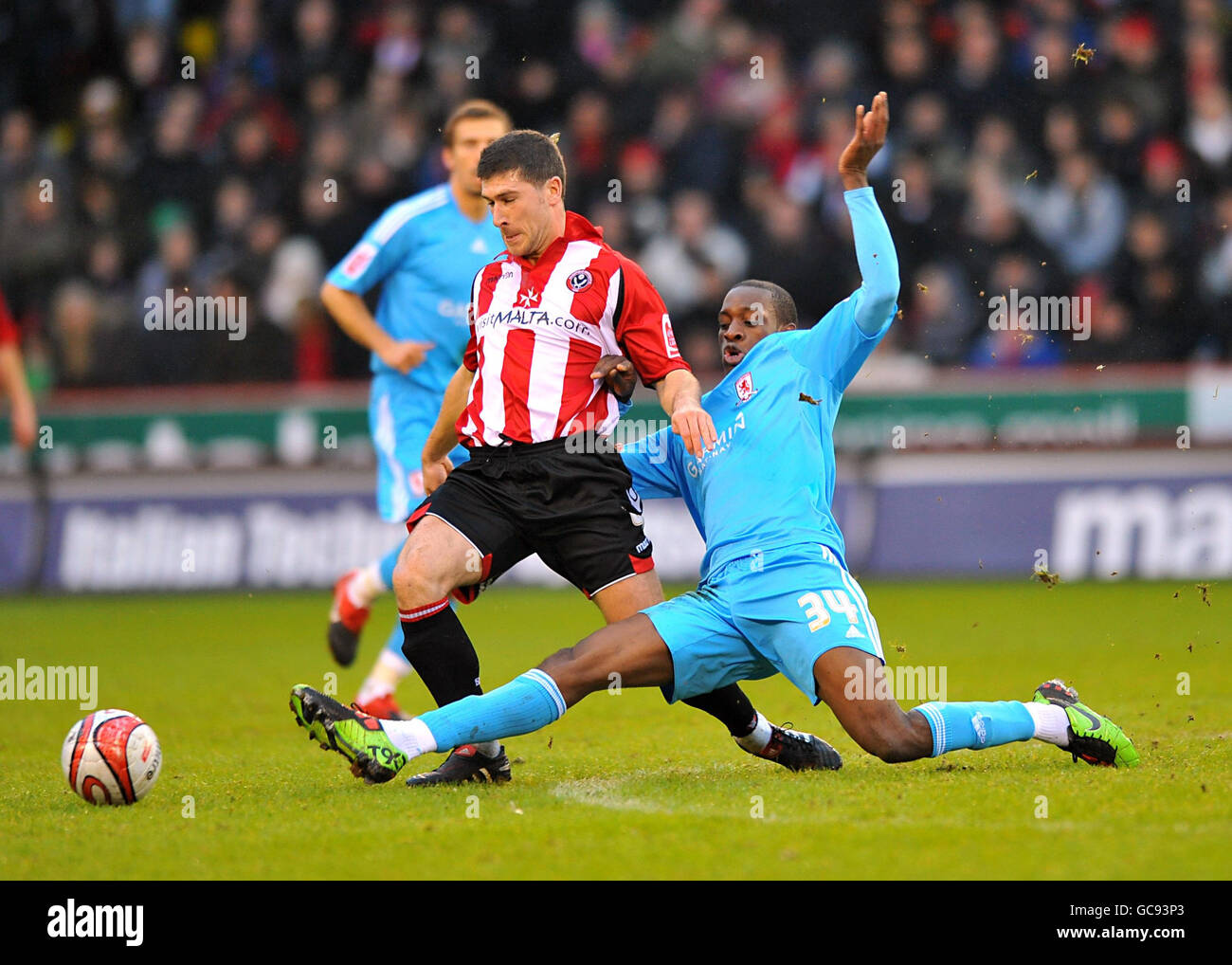 Sheffield United's Nick Montgomery and Middlesbrough's Isiah Osbourne ...