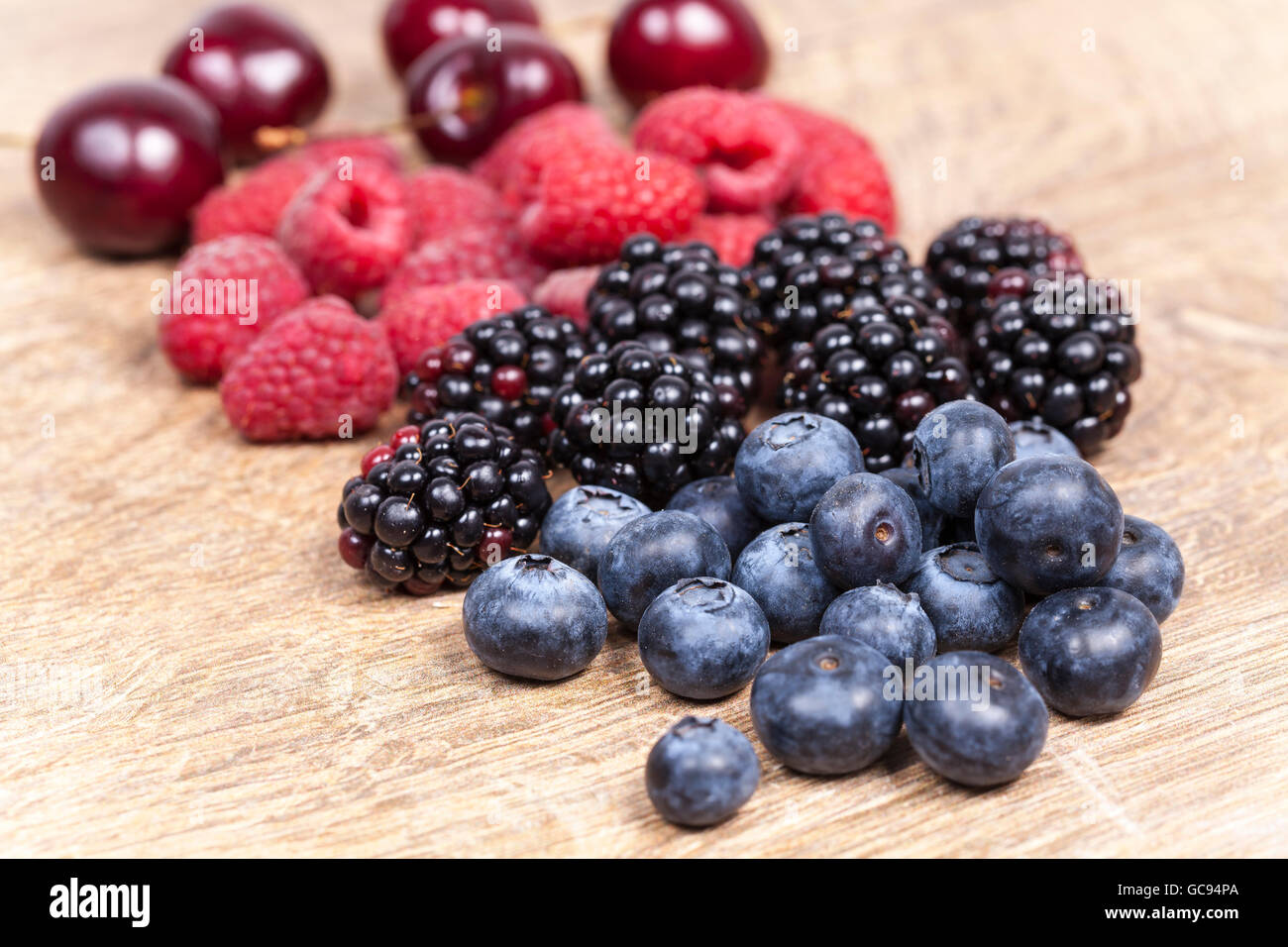 Blueberry, raspberry, blackberry and cherry fruits Stock Photo - Alamy