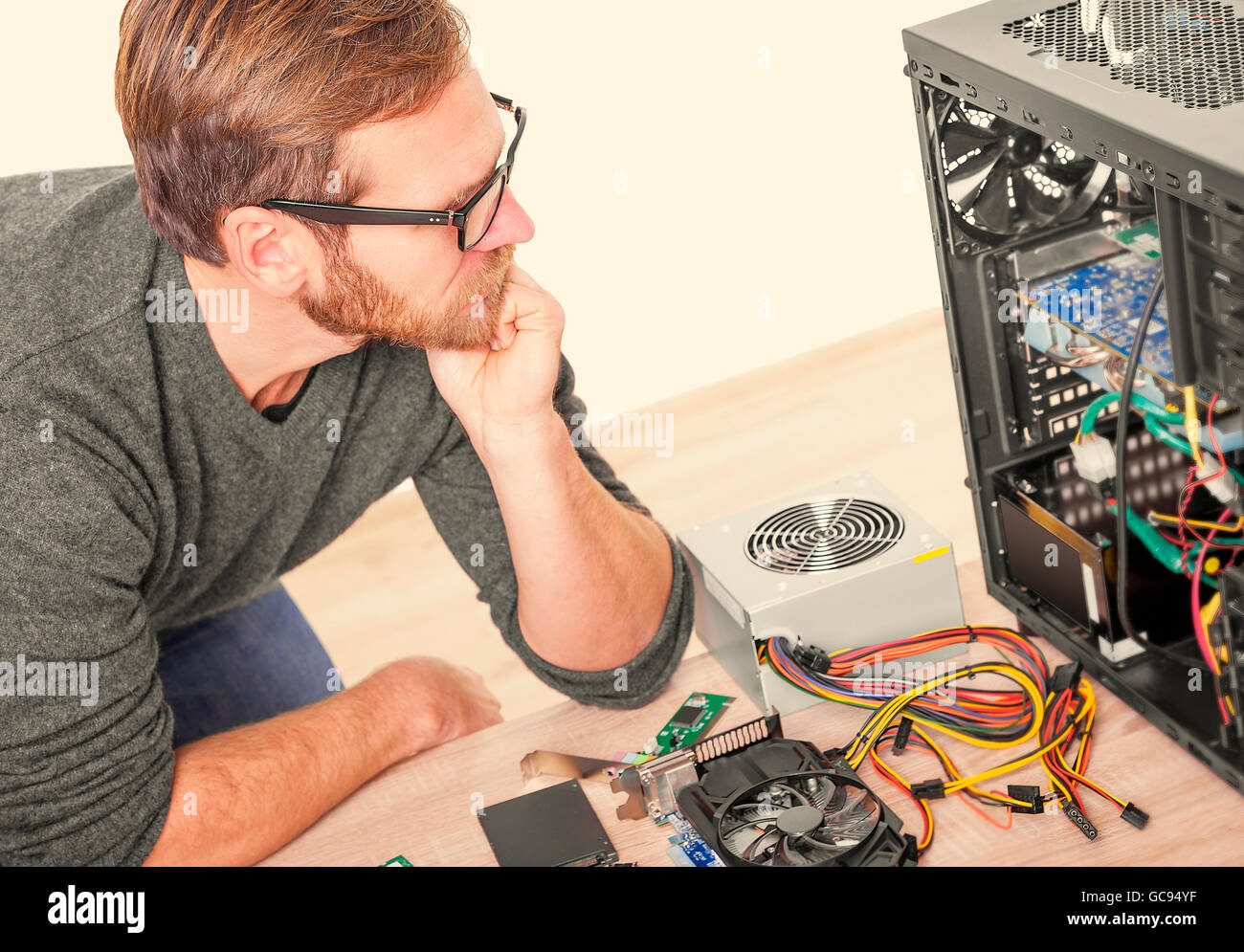 Man breaks his head on the problem of the computer. Toned image Stock ...