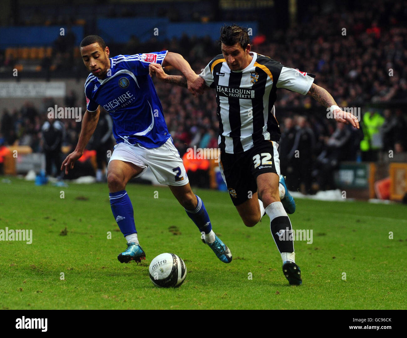 Port Vale's Lewis Haldane (right) and Macclesfield Town's Izak Reid ...