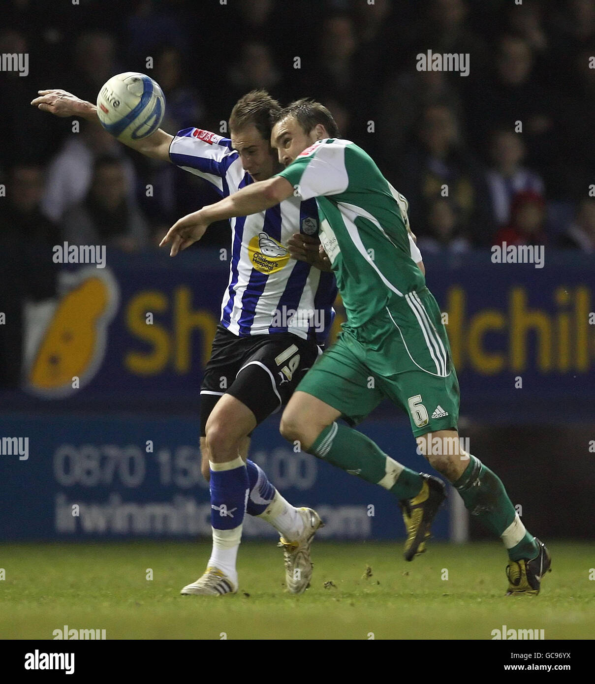 Sheffield Wednesday's Luke Varney and Peterborough United's Charlie Lee ...
