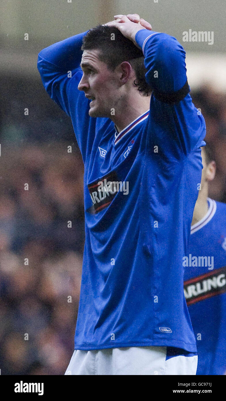 Rangers' Kyle Lafferty shows his frustration after missing an attempted ...