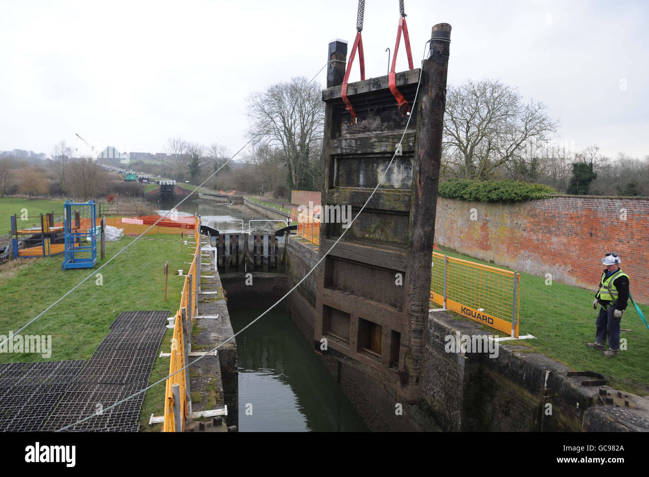 A lock gate is lifted from Caen Hill Locks near Devizes as work ...