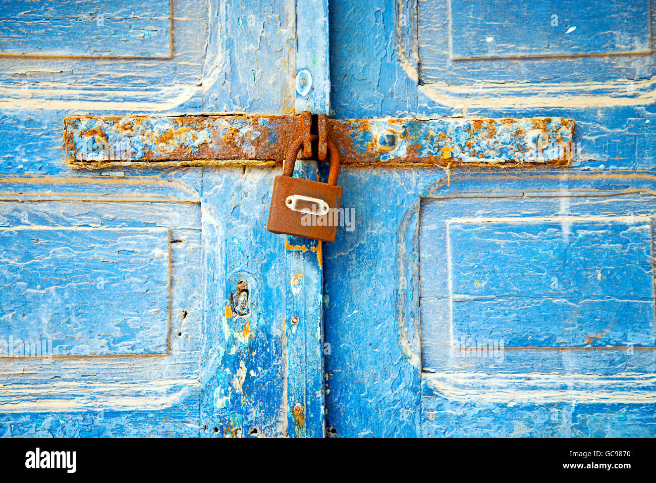 morocco in africa the old wood facade home and rusty safe padlock Stock ...
