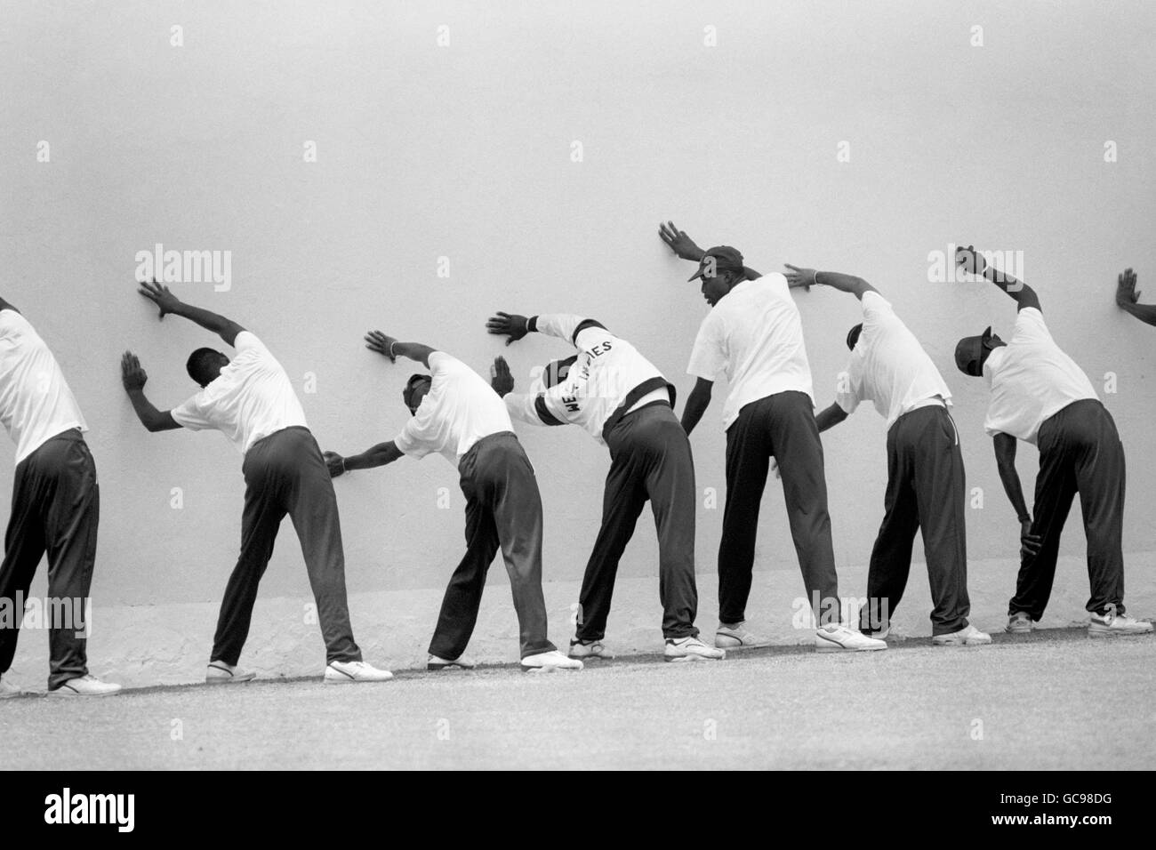 WEST INDIAN FAST BOWLER CURTLY AMBROSE LOOKS OVER HIS SHOULDER AT HIS ...