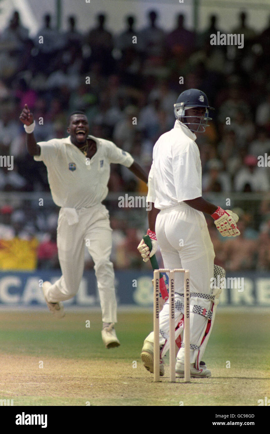 WEST INDIAN FAST BOWLER CURTLY AMBROSE CELEBRATES THE WICKET OF ENGLAND ...