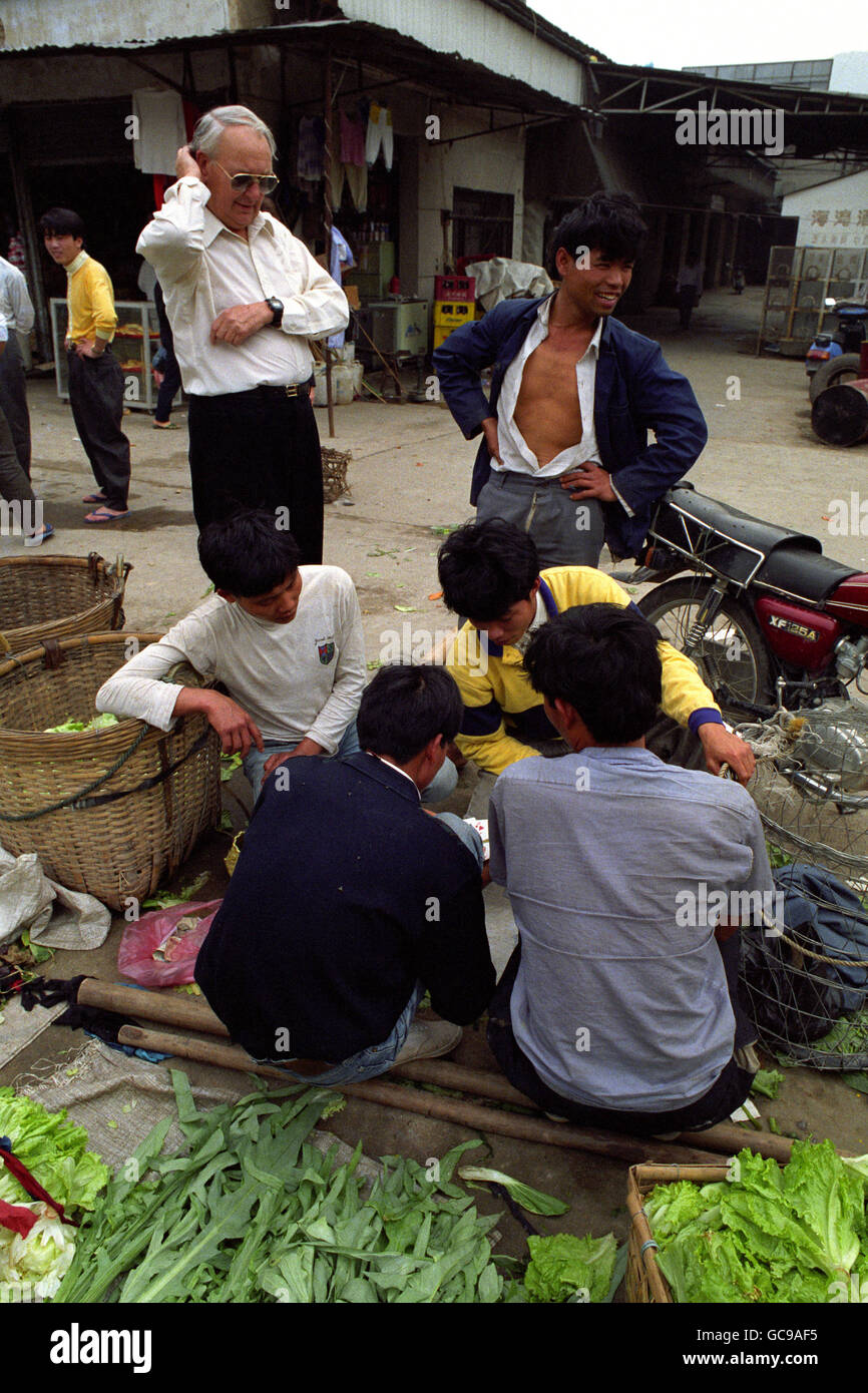 Sir freddie laker watching gamblers in street market shekou province hi ... Sir freddie laker watching gamblers in street market shekou province hi ...