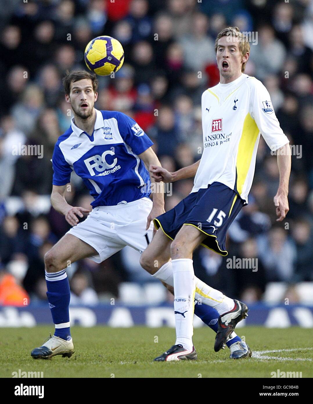 Birmingham City's Roger Johnson (left) and Tottenham Hotspur's Peter ...