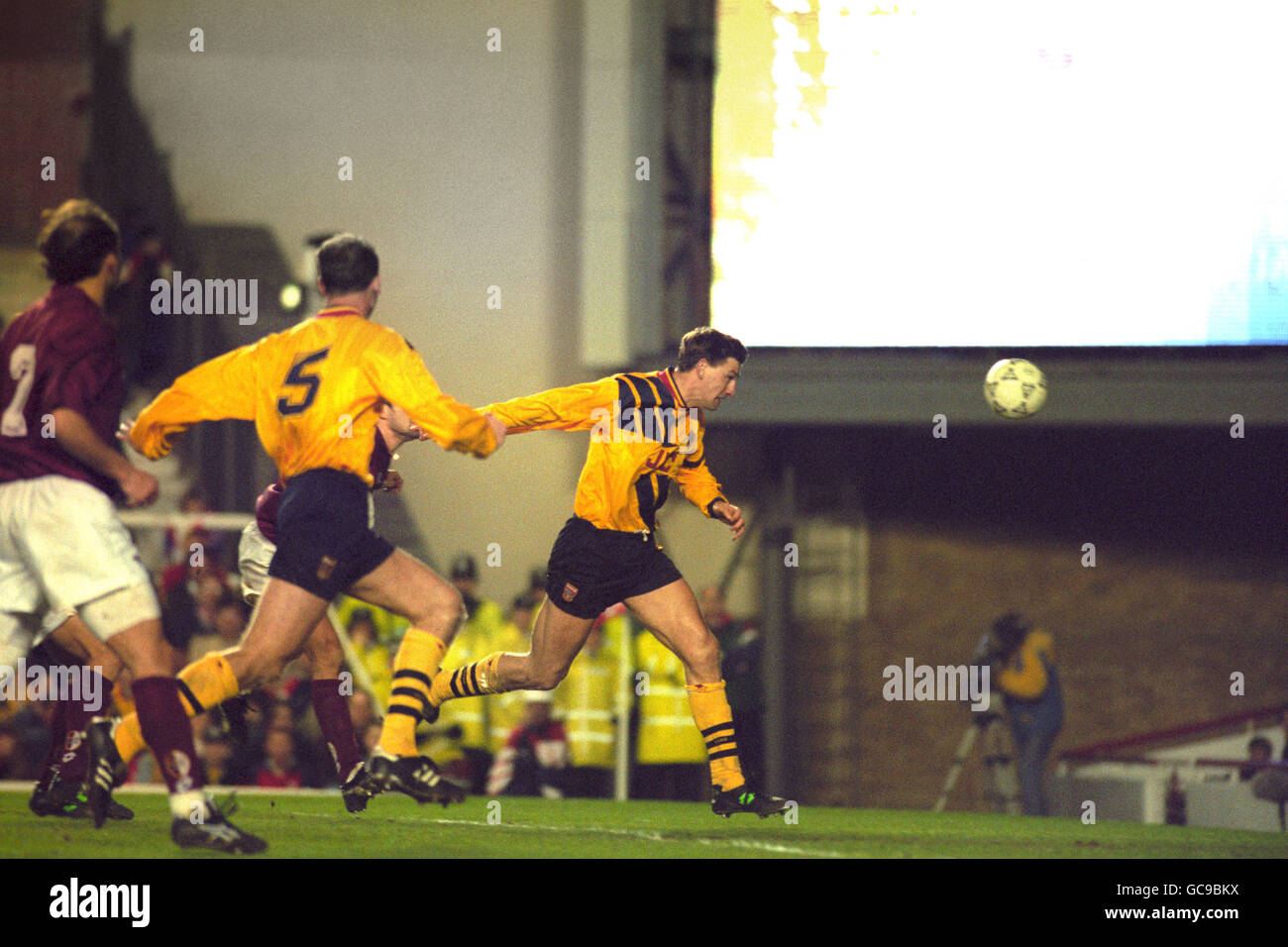 ARSENAL'S TONY ADAMS HEADS THE BALL TO SCORE THE SINGLE WINNING GOAL AS ...