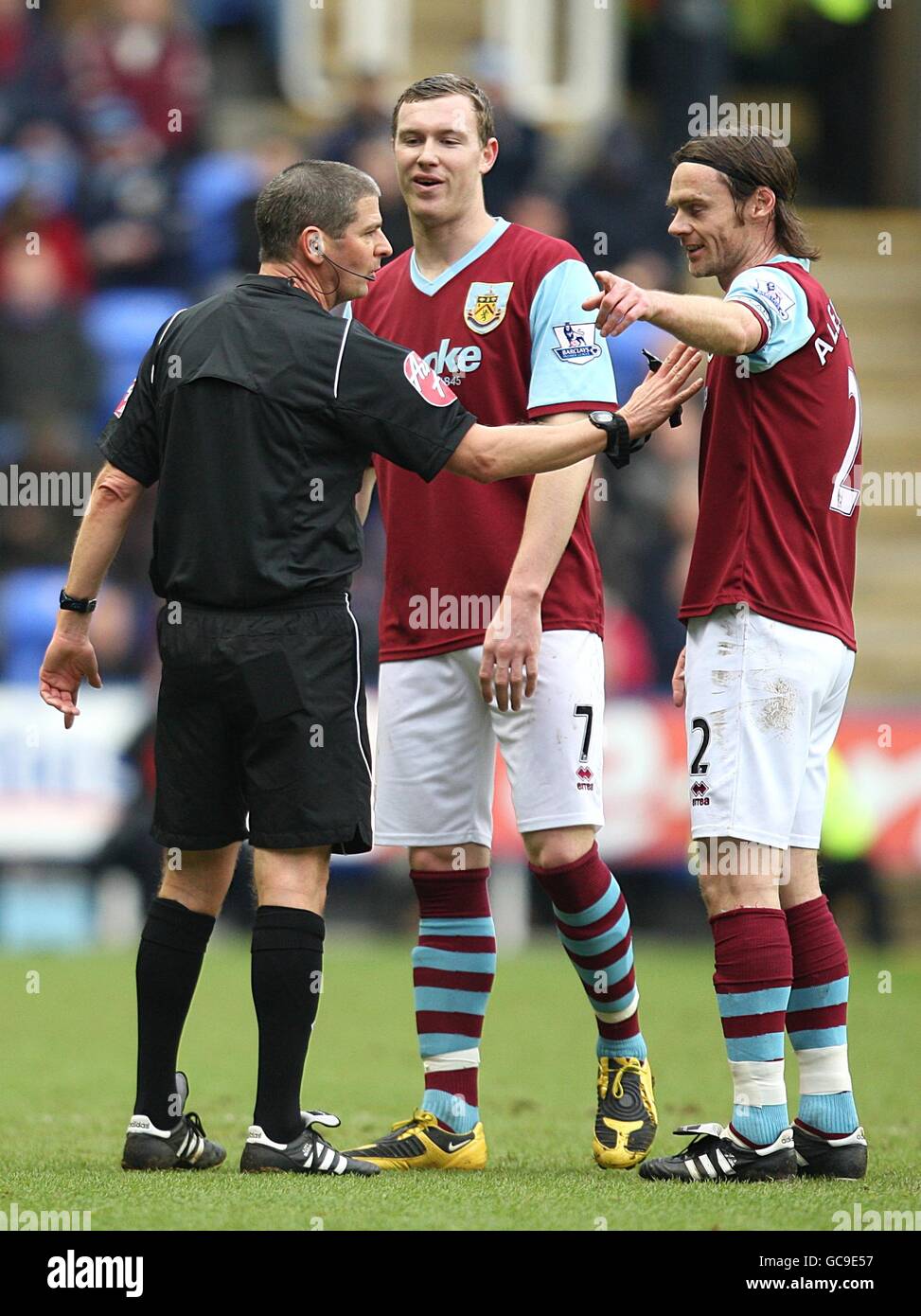 Referee Andy D'Urso (left) and Burnley's Graham Alexander (right) have ...
