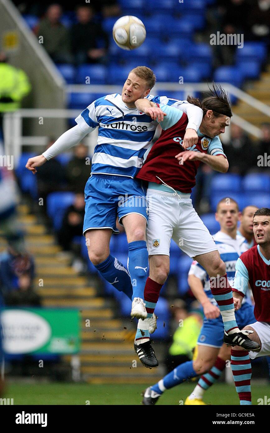 Burnley's Graham Alexander (right) and Reading's Matthew Mills battle ...