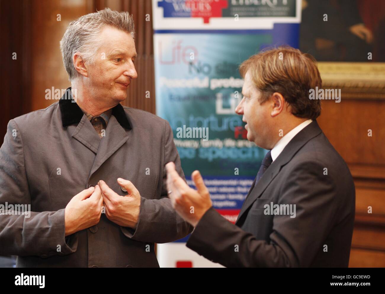 Musician Billy Bragg, left, talks to Charles Dunstone, CEO of TalkTalk ...