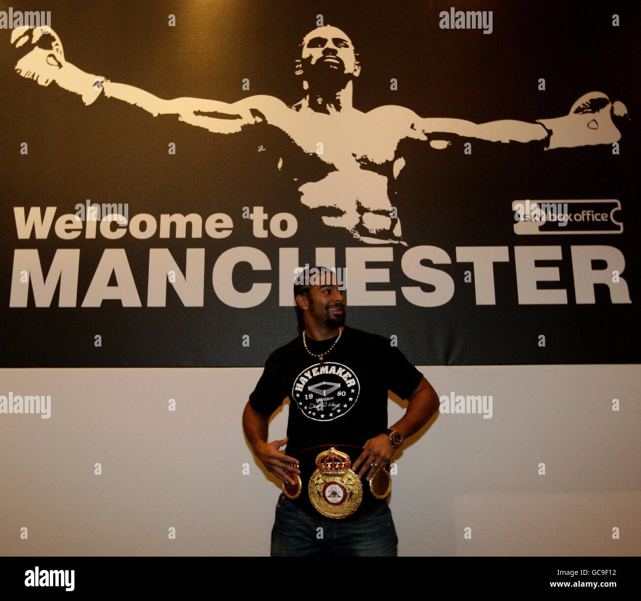 David Haye unveils a 'Welcome To Manchester' banner during the press ...