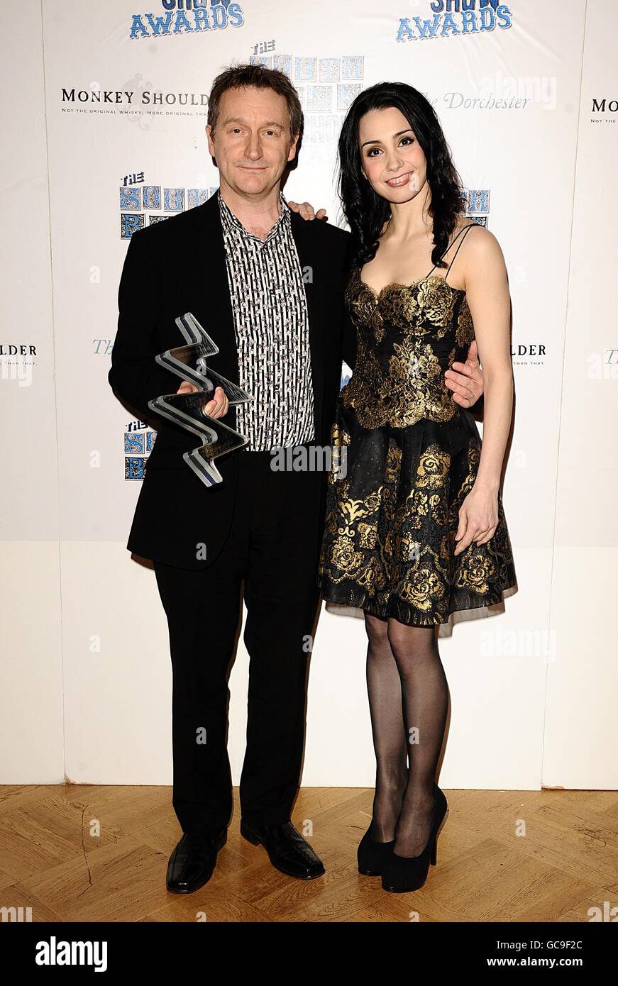 David Bintley with the Dance award, presented by Tamara Rojo (right ...