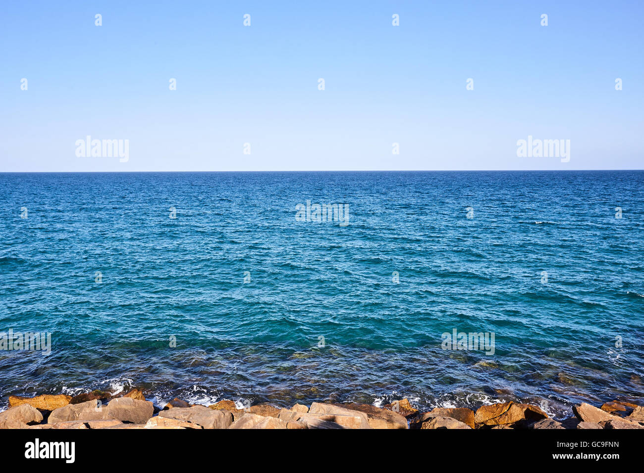 Perfect blue sea and ashore Stock Photo - Alamy