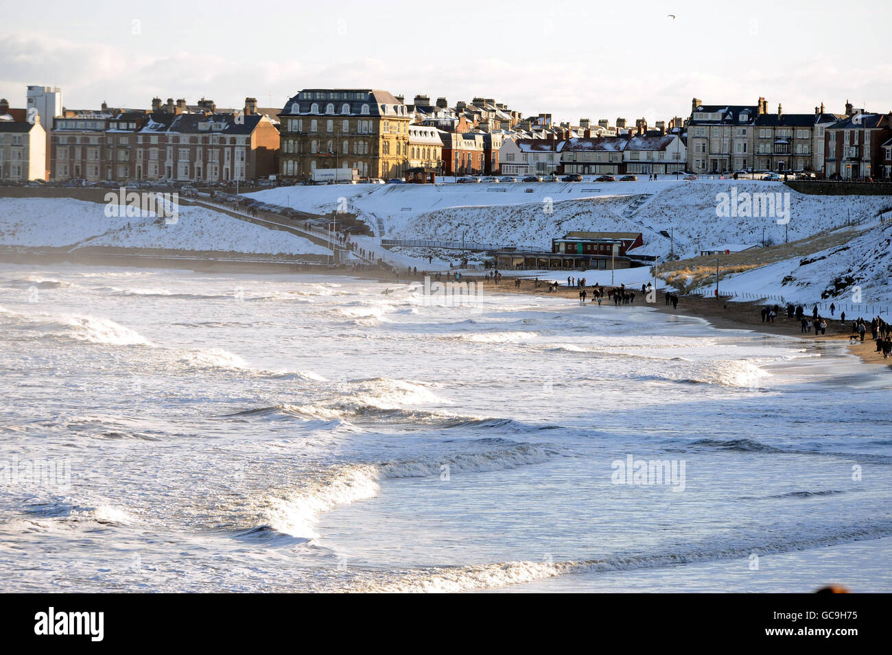 A general view of snow by the sea on Tynemouth beach, as fresh snowfall ...