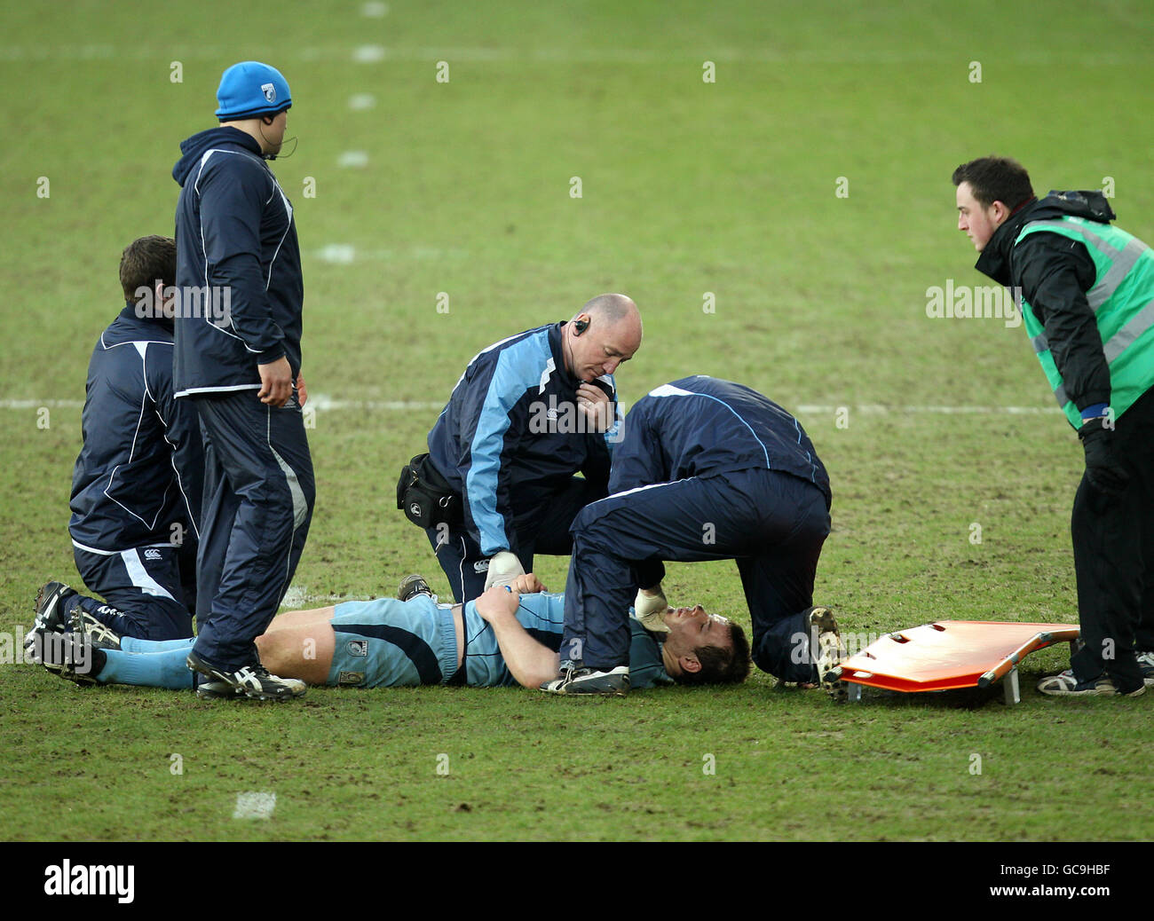 Cardiff's Sam Hobbs is treated on the pitch before being taken off on a ...