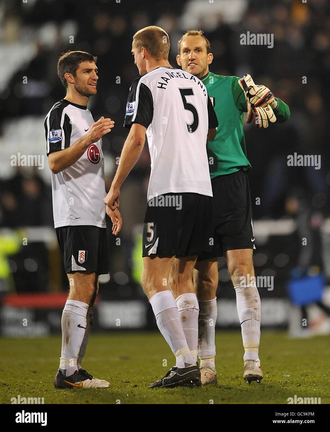(left-right) Fulham's Aaron Hughes, Brede Hangeland and Mark Schwarzer ...