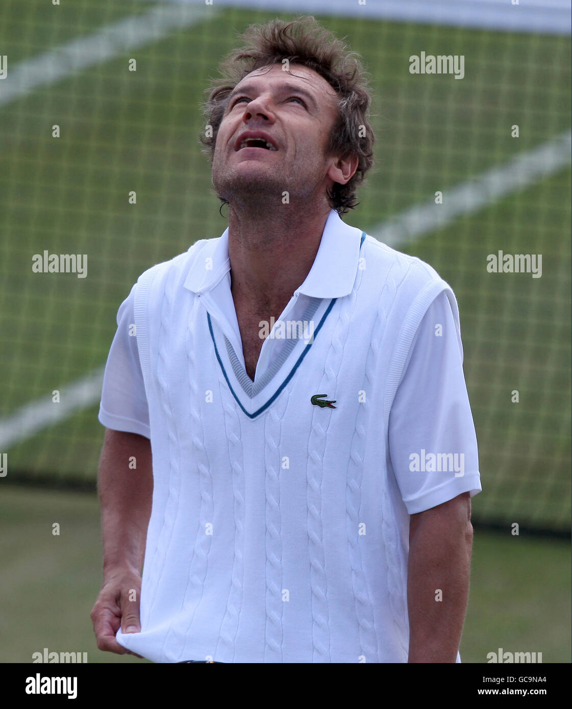 Swedish tennis player Mats Wilander looks up to the sky in frustration ...