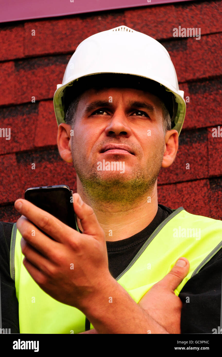Man hard hat phone hi-res stock photography and images - Alamy