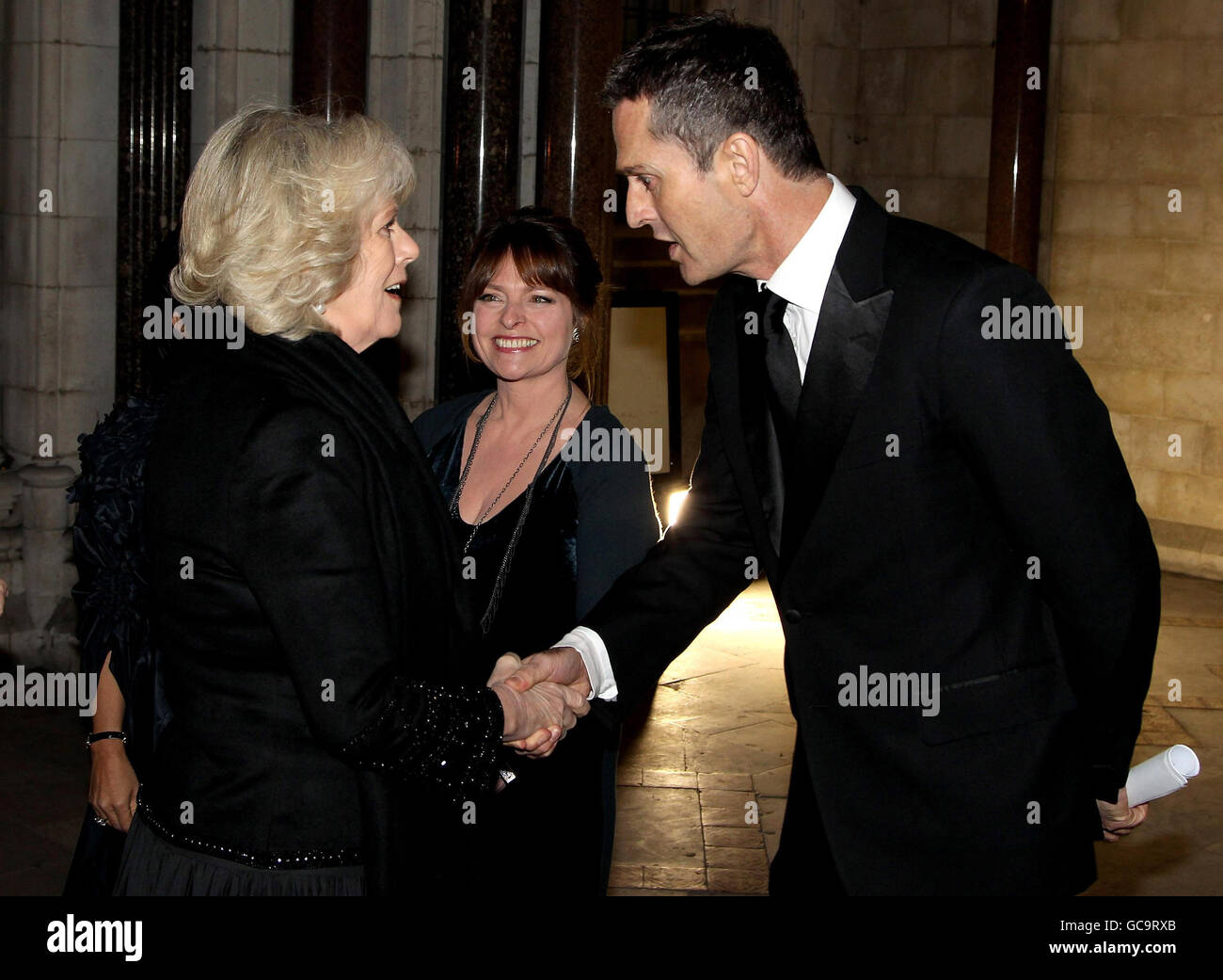The Duchess of Cornwall meets actor Rupert Everett, as actress Janet ...