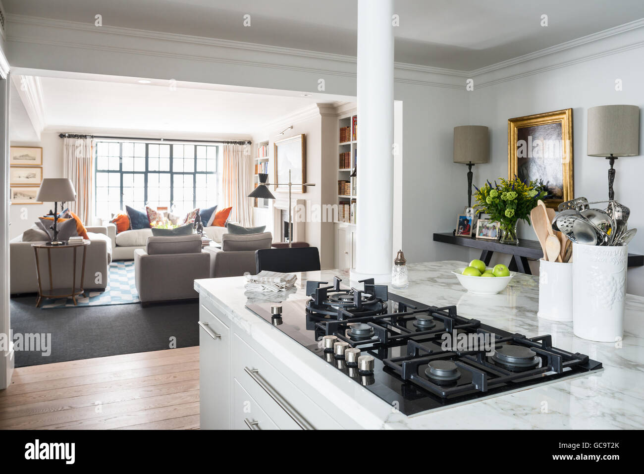 Open plan modern kitchen designed by Stepahnie Dunning in space with ...