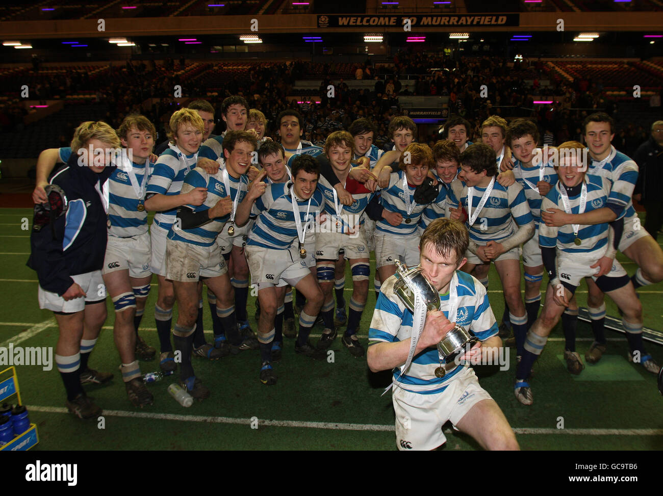 Edinburgh academy captain fraser gillies front leads the team ...