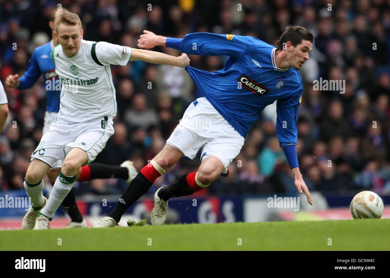 Rangers Kyle Lafferty and Hibernian's Derek Riordan during the ...