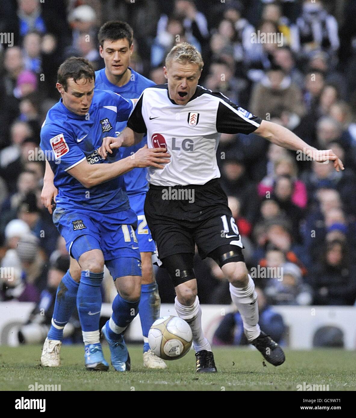 Fulham's Damien Duff (right) and Notts County's Ben Davies (left ...