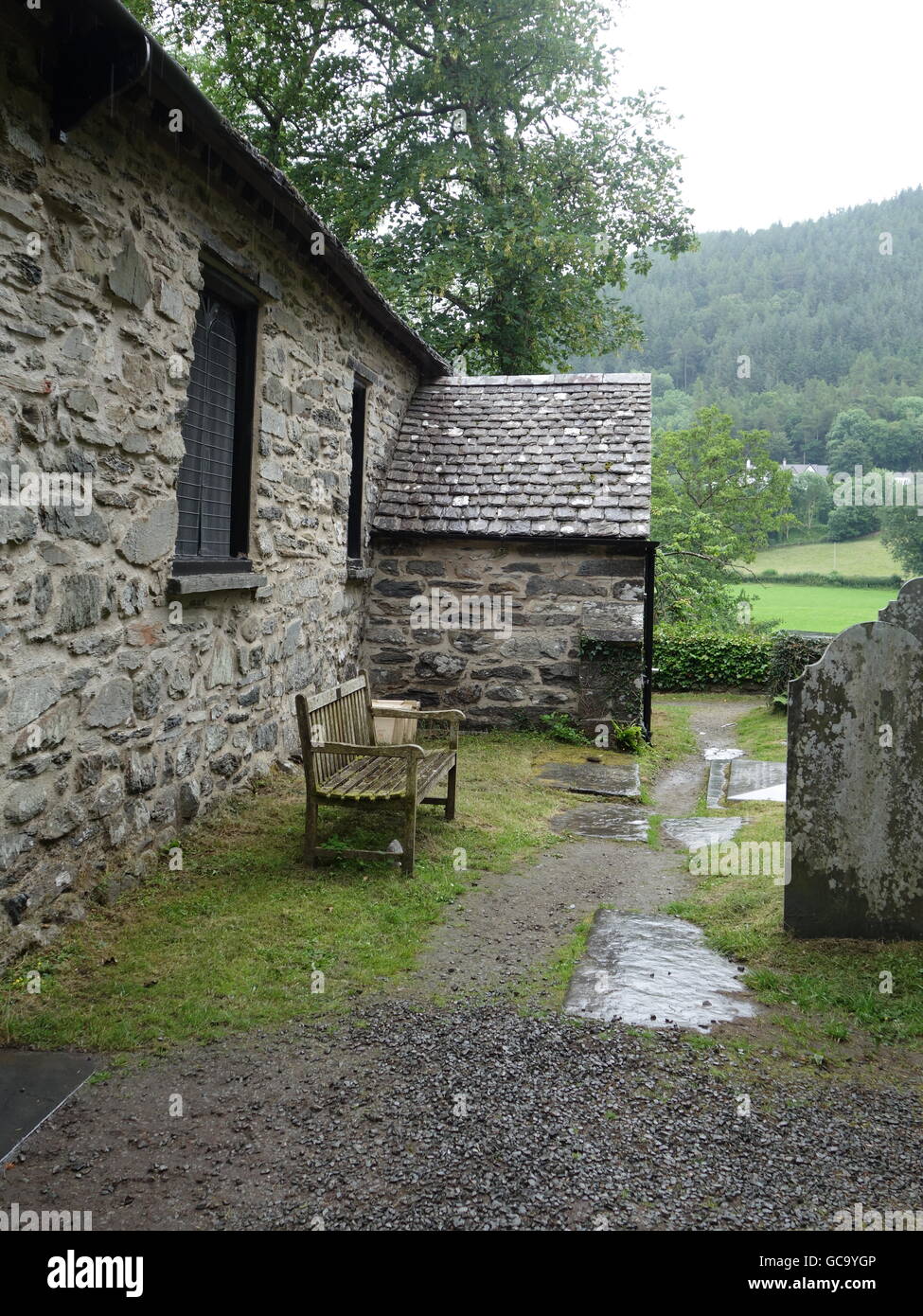 An old church hidden amongst trees Stock Photo - Alamy