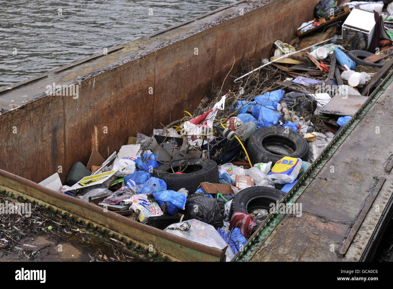 Rubbish piled outside The London Olympic Park under construction for ...