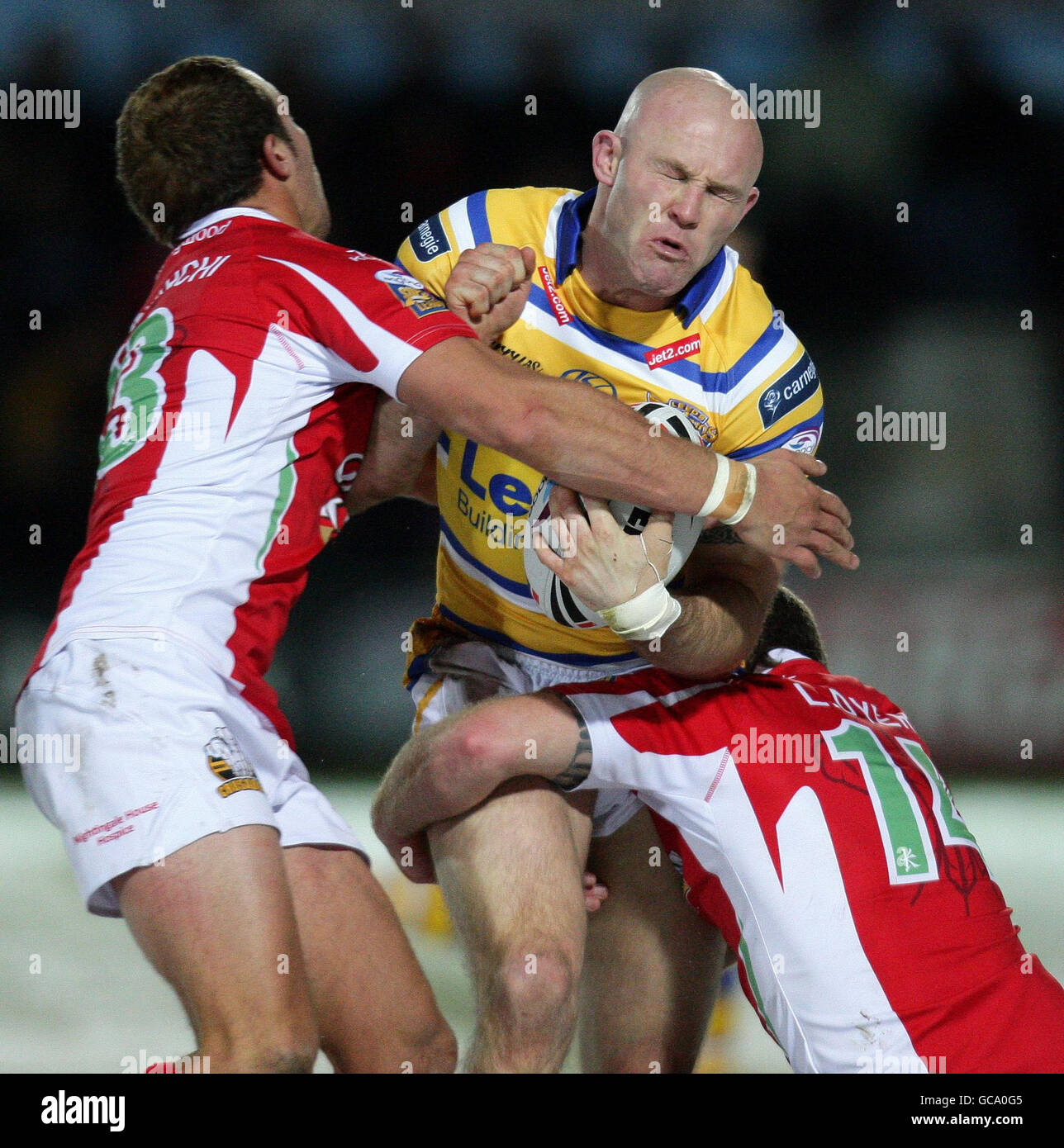 Leeds Rhinos' Keith Senior (centre) is tackled by Celtic Crusaders ...