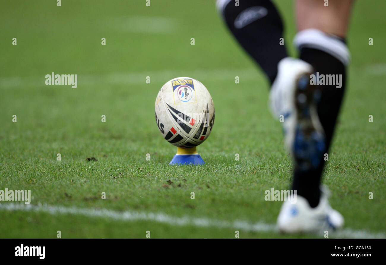 A Hull FC player prepares to kick the ball from a kicking tee Stock ...