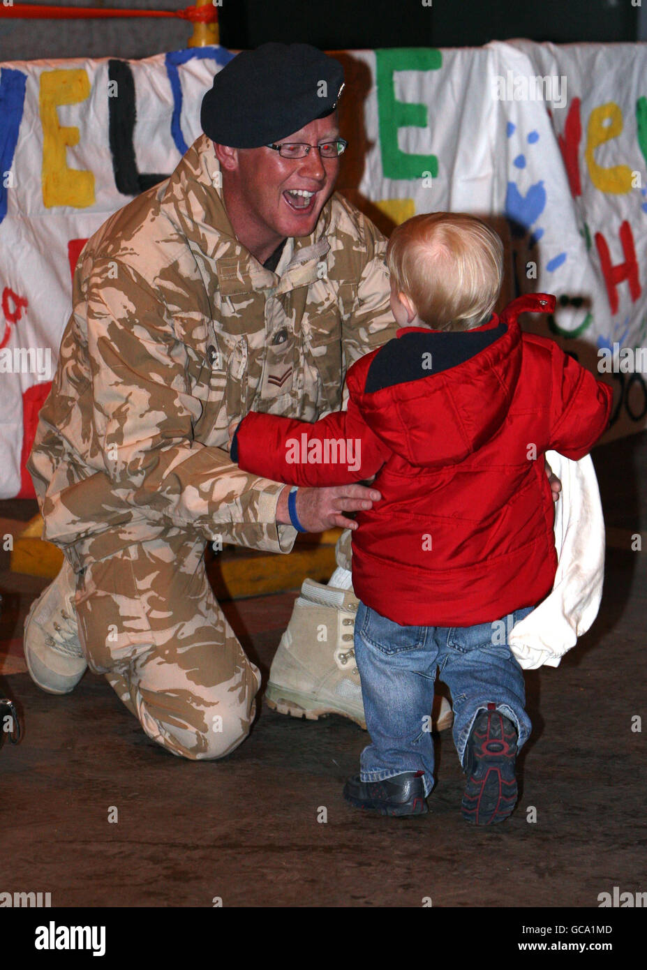 Corporal Mike Balziel, of 27 Sqn RAF Regiment with his son Joshua, on ...