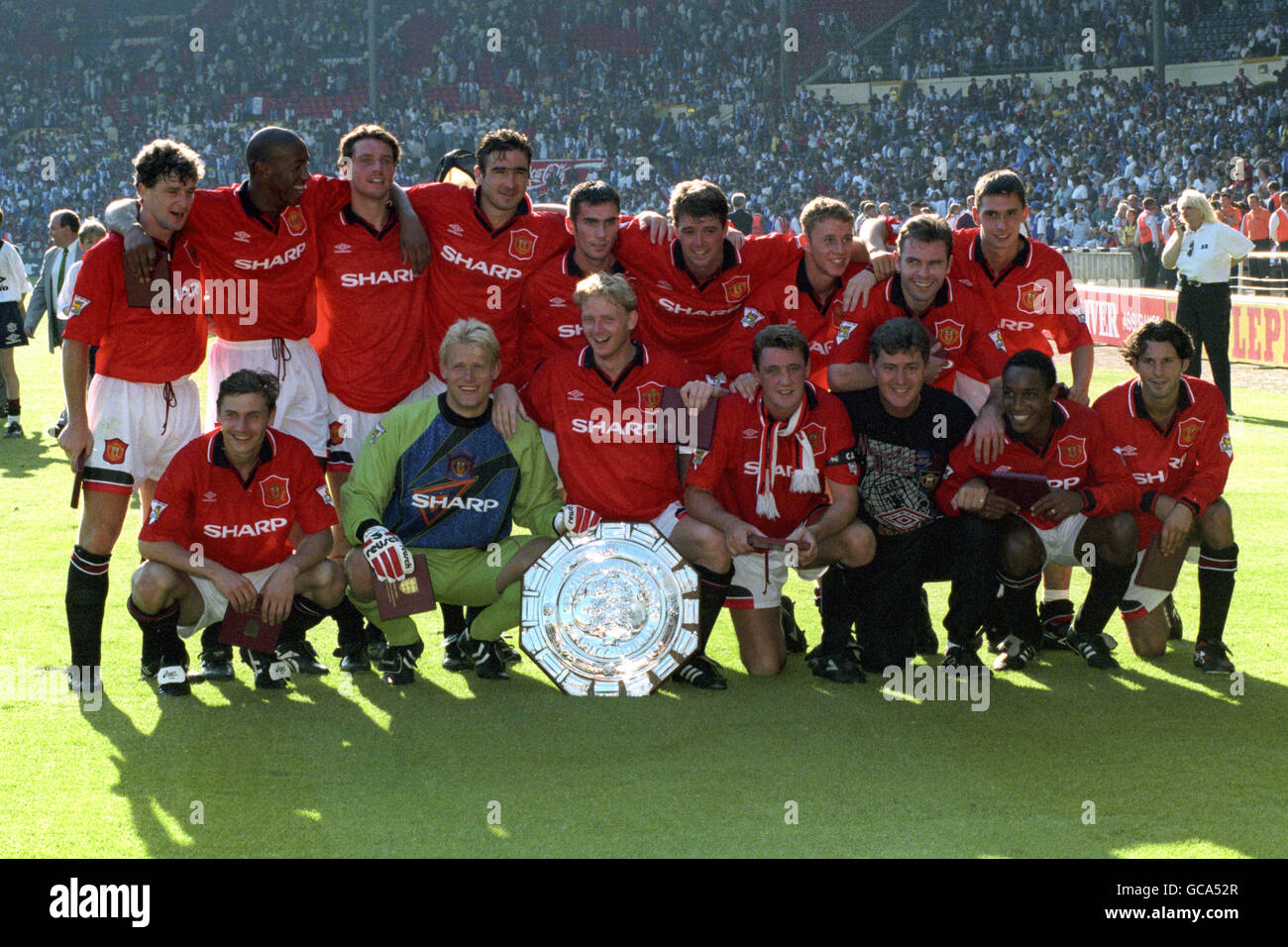 THE VICTORIOUS MANCHESTER UNITED TEAM SHOW OFF THE CHARITY SHIELD AT ...