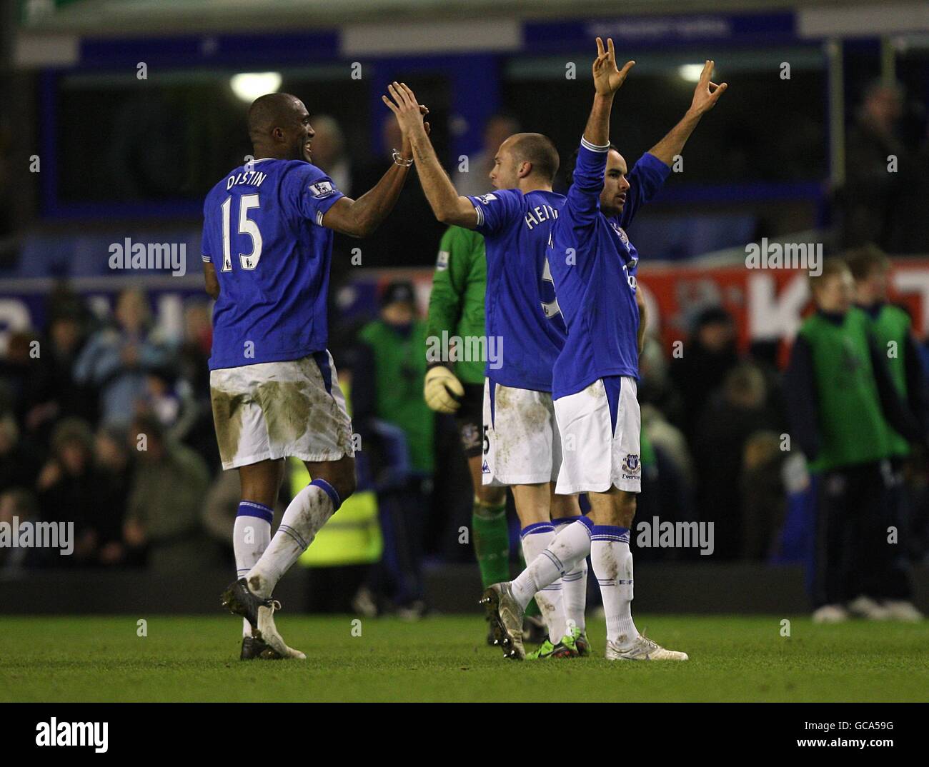 Evertons heitinga with landon donovan right after the final whistle hi ...