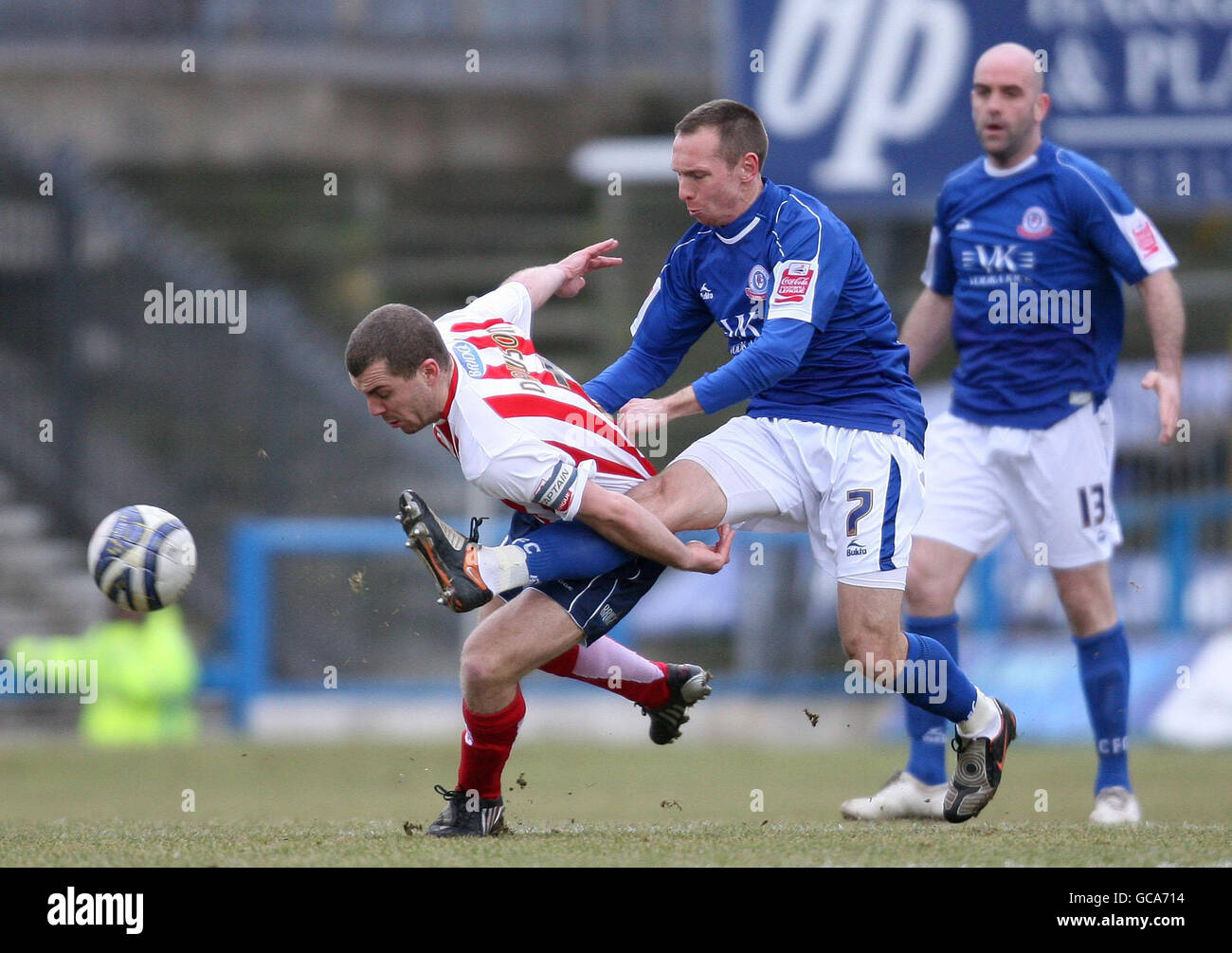 Chesterfield's Mark Allott and Bury's Stephen Dawson battle for the ...