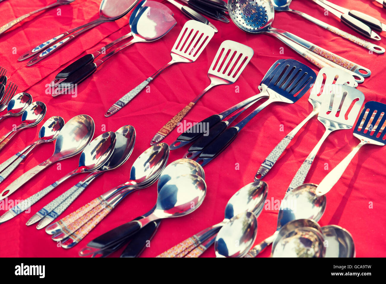 Kitchen utensils sale market stall hi-res stock photography and images ...