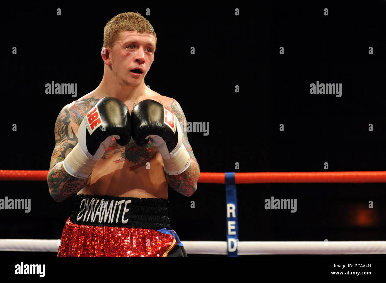 Dean Miles in action against Gary Sykes during the super featherweight bout at Harvey Hadden ...