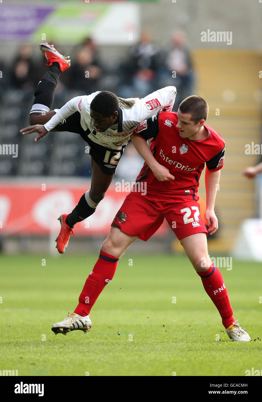 Swansea City's Nathan Dyer is sent flying by Preston North End's Eddie ...