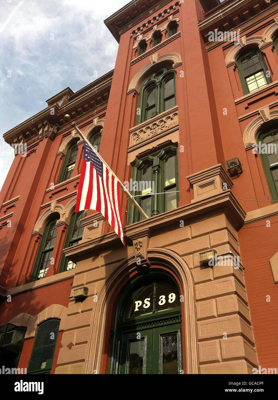 School building with US flag in Brooklyn, New York Stock Photo - Alamy