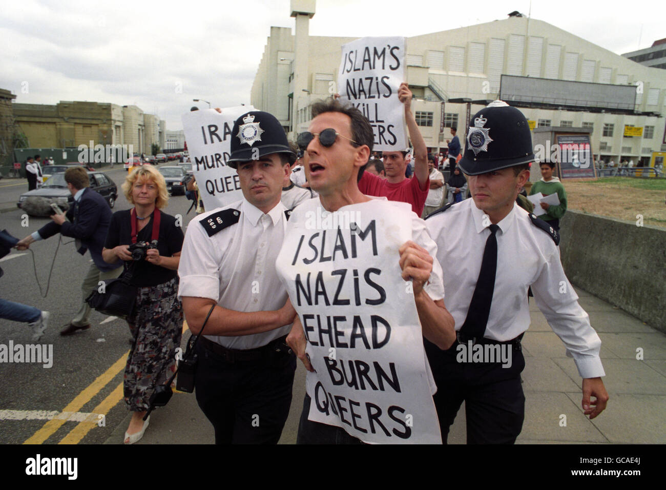 GAY RIGHTS CAMPAIGNER PETER TATCHELL IS LED AWAY BY POLICE OFFICERS ...